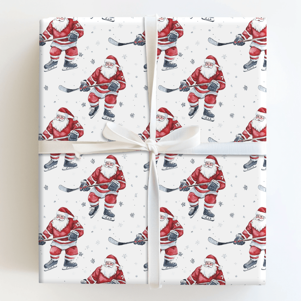 Jolly Puckster Wrapping Paper: Hockey Santa Gift Wrap – Page 1Wrapping ...